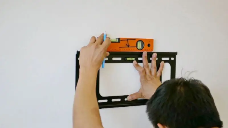 How to Mount a TV Without Drilling Safely Guide 2026